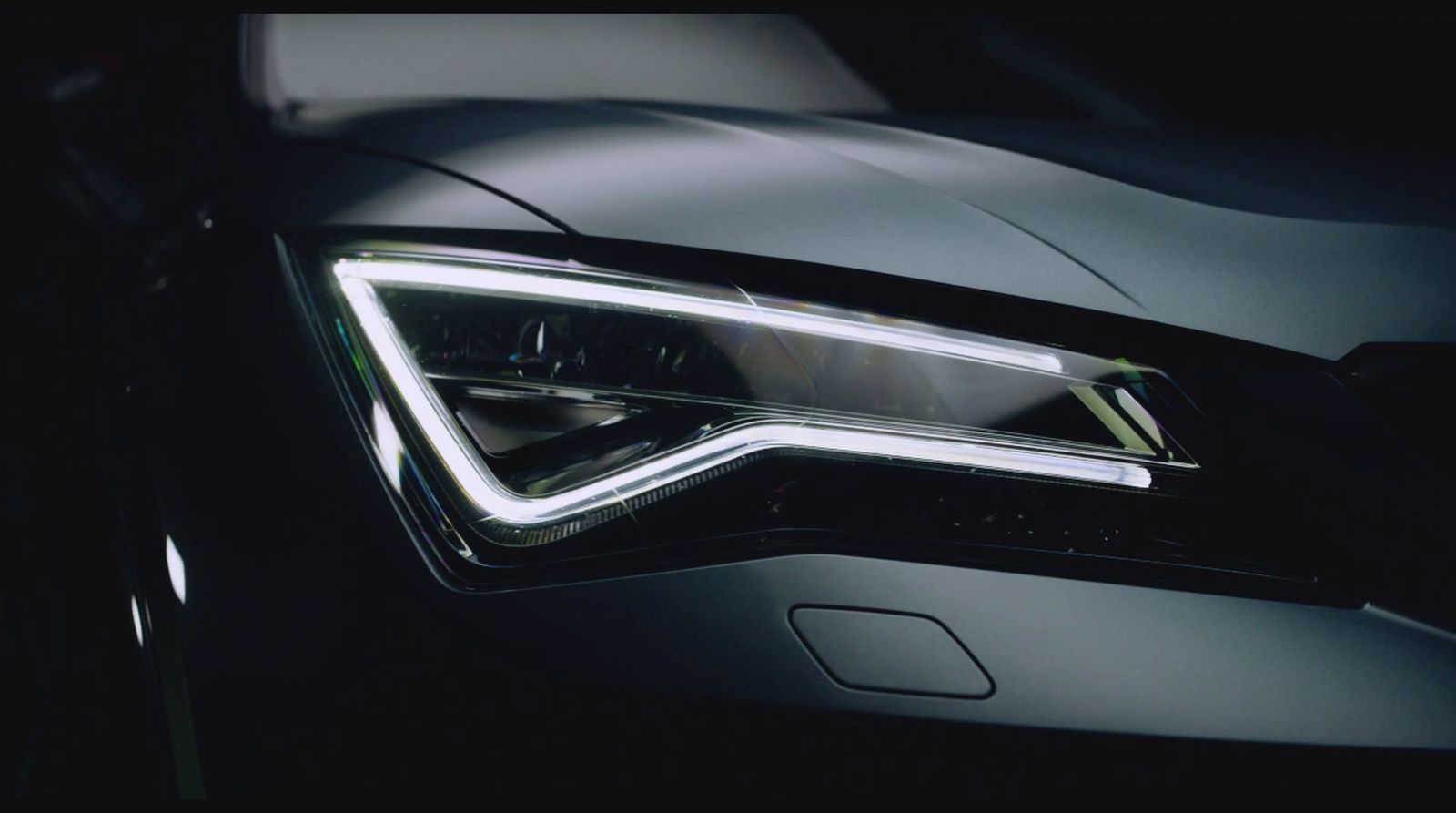 A close up of the headlight of a car | Kive